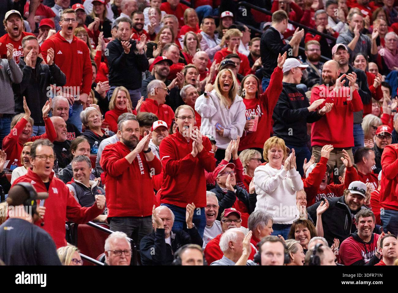 Nebraska fans react after a play against Oregon during the first half ...