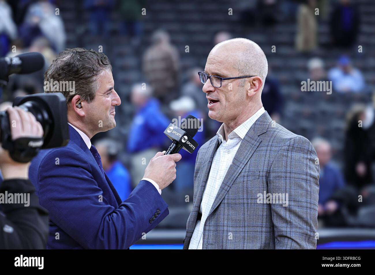 UConn Huskies head coach Dan Hurley being interviewed by TNT Sports ...