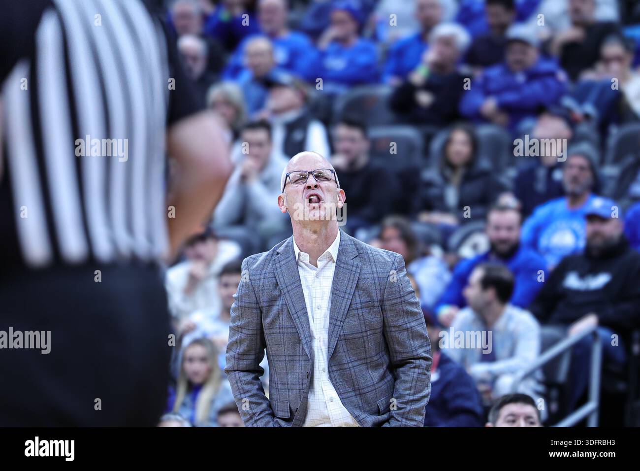 UConn head coach Dan Hurley yells at the official during the game at ...