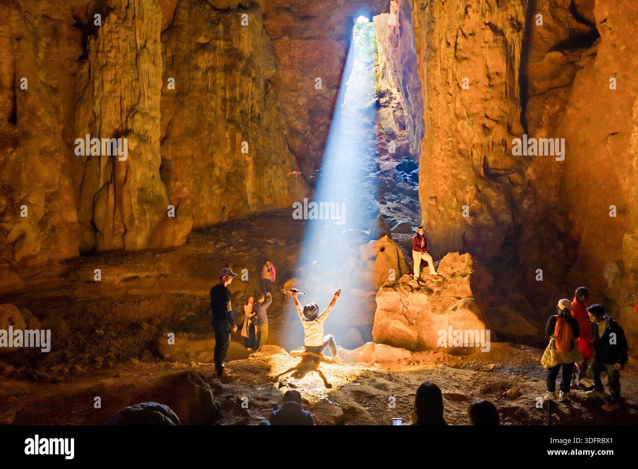 LAIBIN, CHINA - JANUARY 13, 2026 - Tourists experience a column of ...
