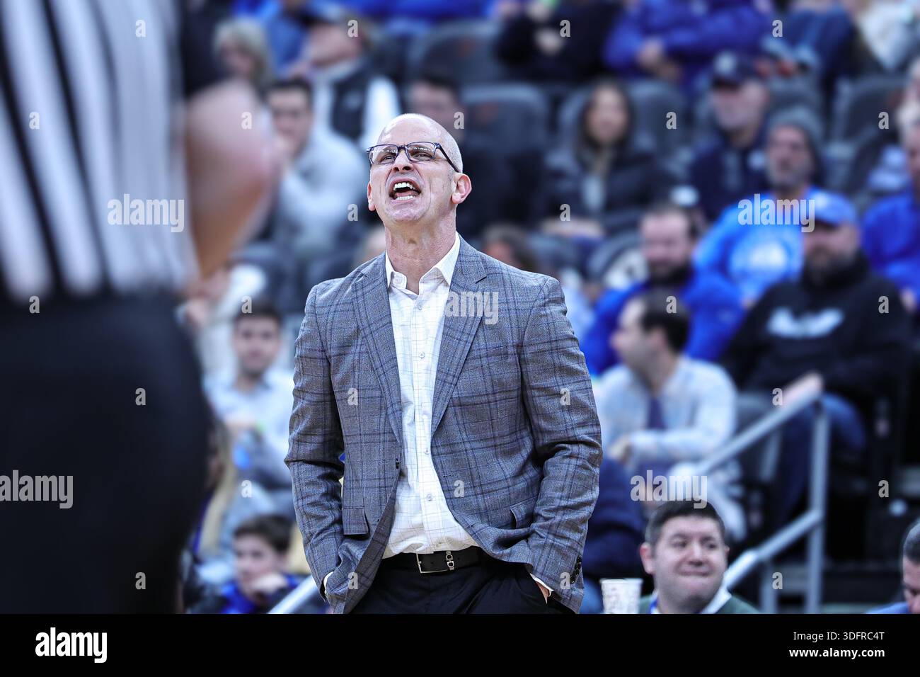 UConn head coach Dan Hurley yells at the official during the game at ...
