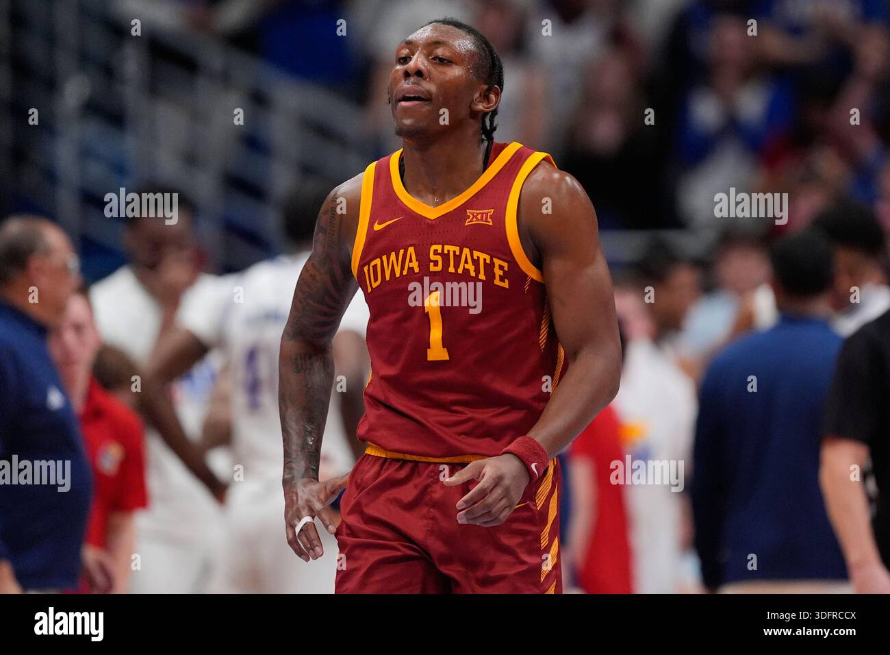 Iowa State guard Jamarion Batemon walks to the bench for a time out ...