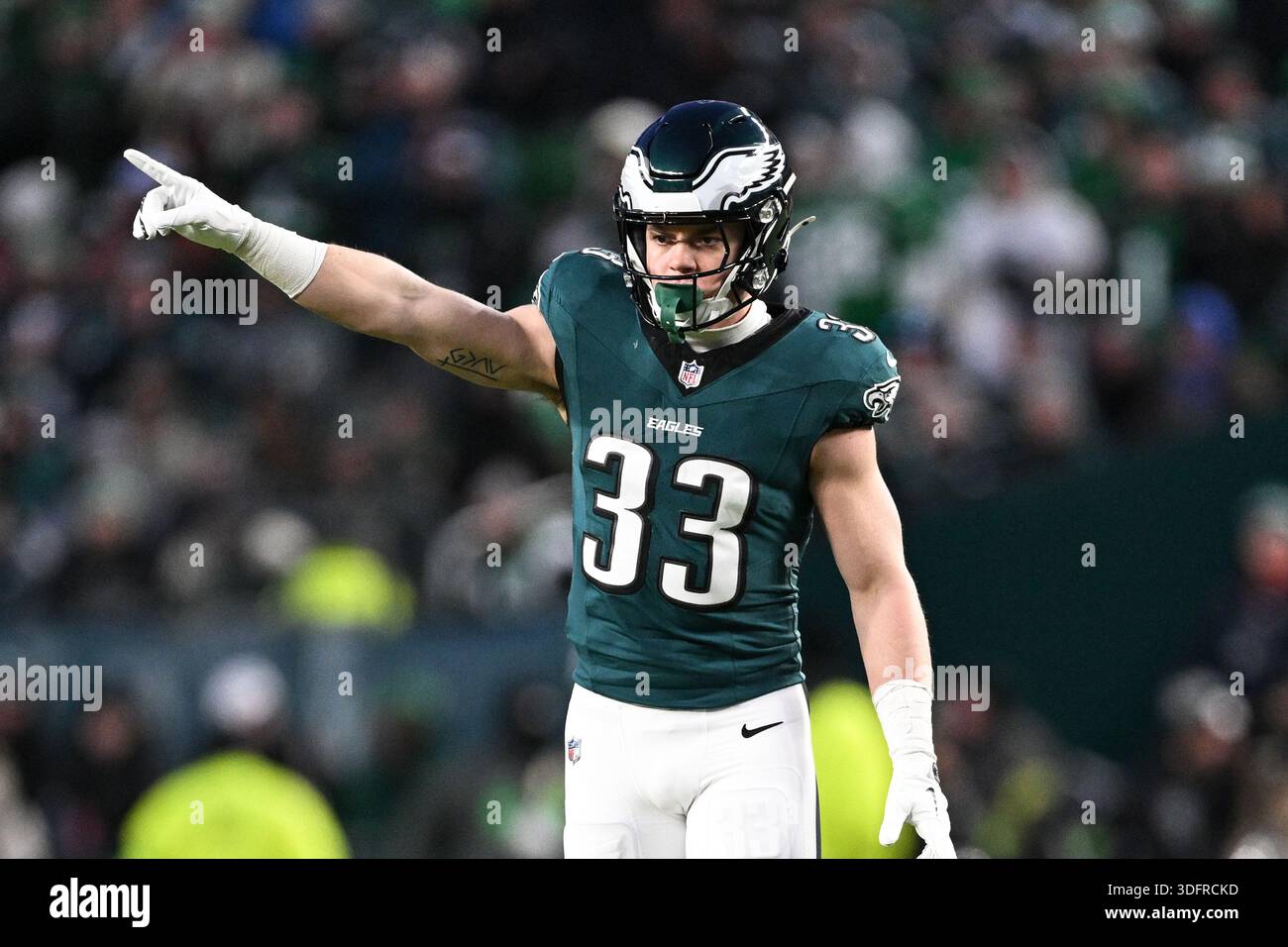 Philadelphia Eagles cornerback Cooper DeJean (33) gesture between plays ...