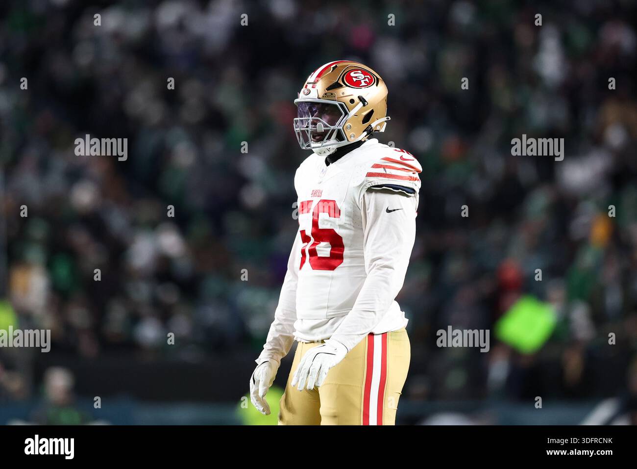 San Francisco 49ers defensive end Keion White looks on between plays ...