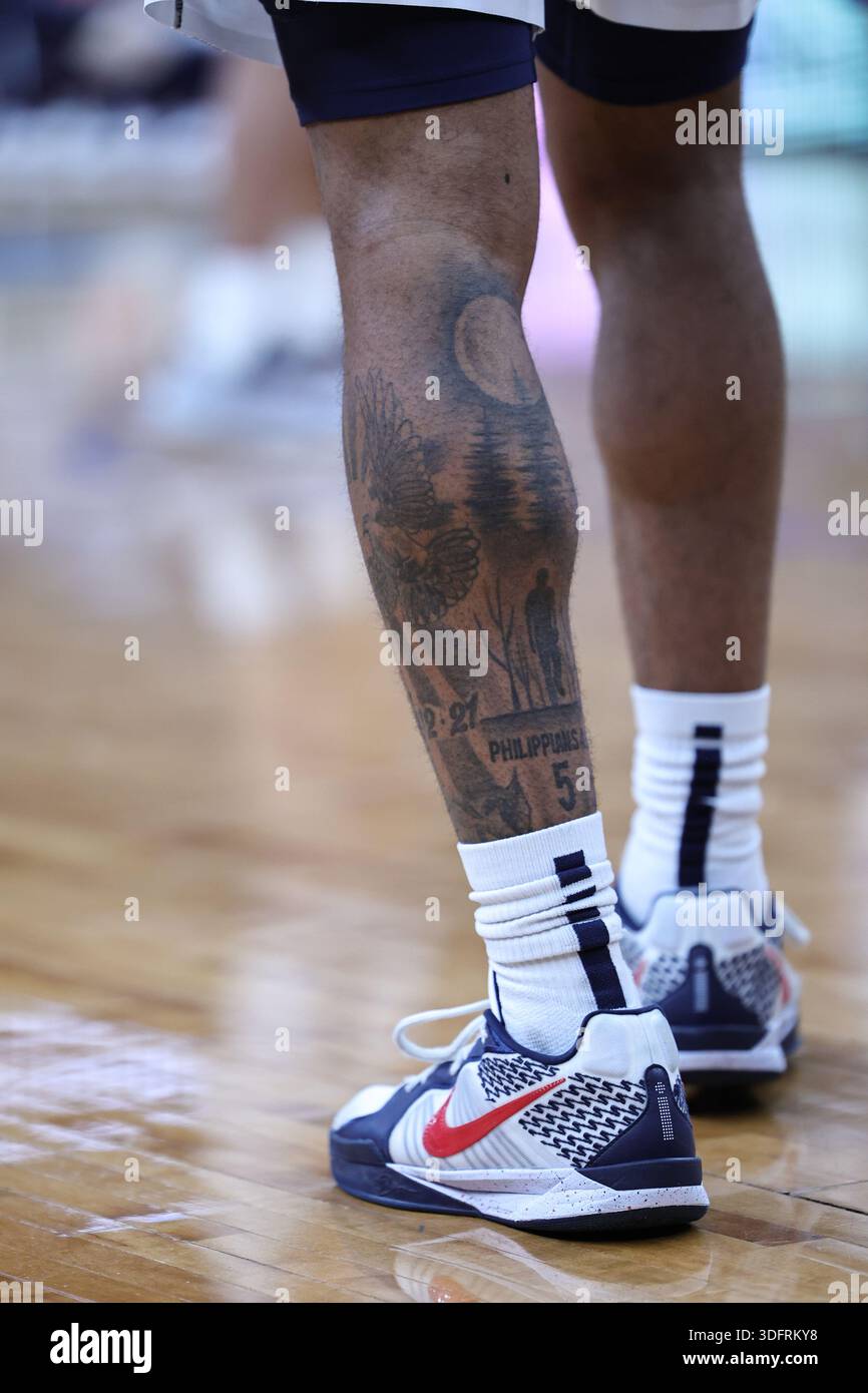 Newark, USA. 13th Jan, 2026. Tattoos on the leg of UConn Huskies guard ...