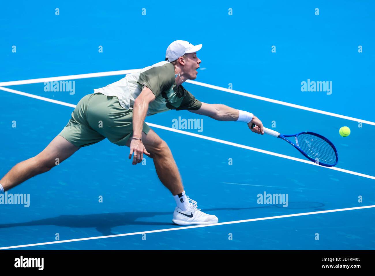 Melbourne, Australia. 14th Jan, 2026. Denis Shapovalov of Canada plays ...