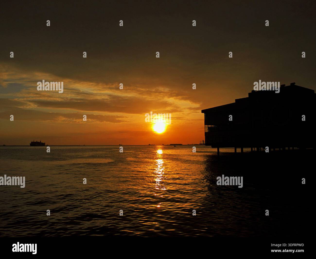 Sunset in Manila city, Philippines Stock Photo - Alamy