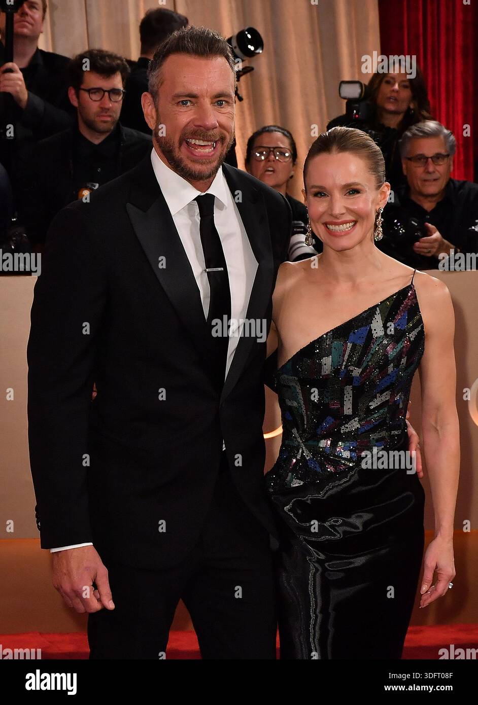 Beverly Hills, USA. 13th Jan, 2026. Dax Shepard and Kristen Bell attend ...