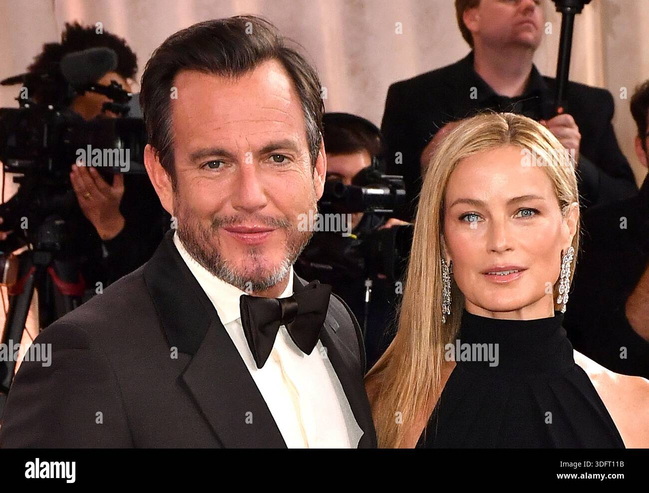 Beverly Hills, USA. 13th Jan, 2026. Will Arnett and Carolyn Murphy ...