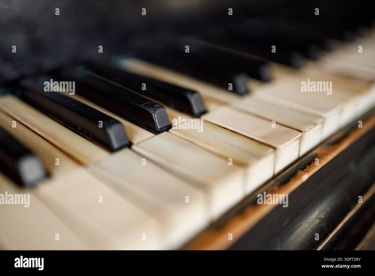 Worn Piano Keys on Antique Grand Piano Stock Photo - Alamy