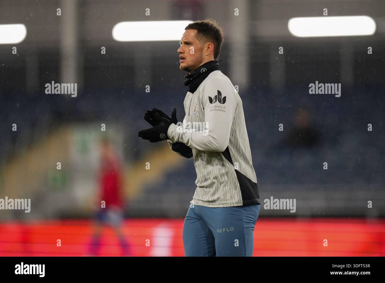 Jerry Yates (9) of Luton Town warms up ahead of the EFL Vertu Trophy ...