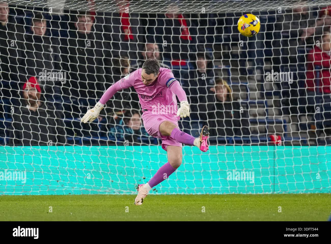 Luton, UK. 13th Jan, 2026. Goalkeeper James Shea (1) of Luton Town ...