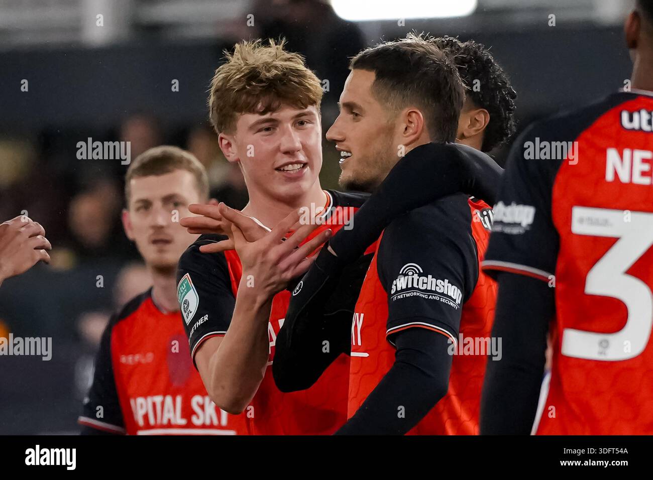 Luton, UK. 13th Jan, 2026. Jerry Yates (9) of Luton Town (centre ...