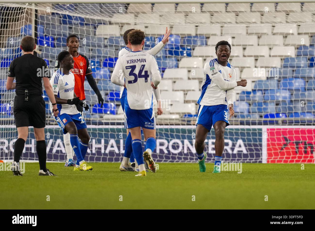 Kal Naismith (3) of Luton Town (right) celebrates after he scores his ...