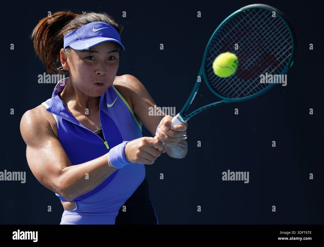 Melbourne, Australia. 14th Jan, 2026. Yuan Yue of China hits a return ...