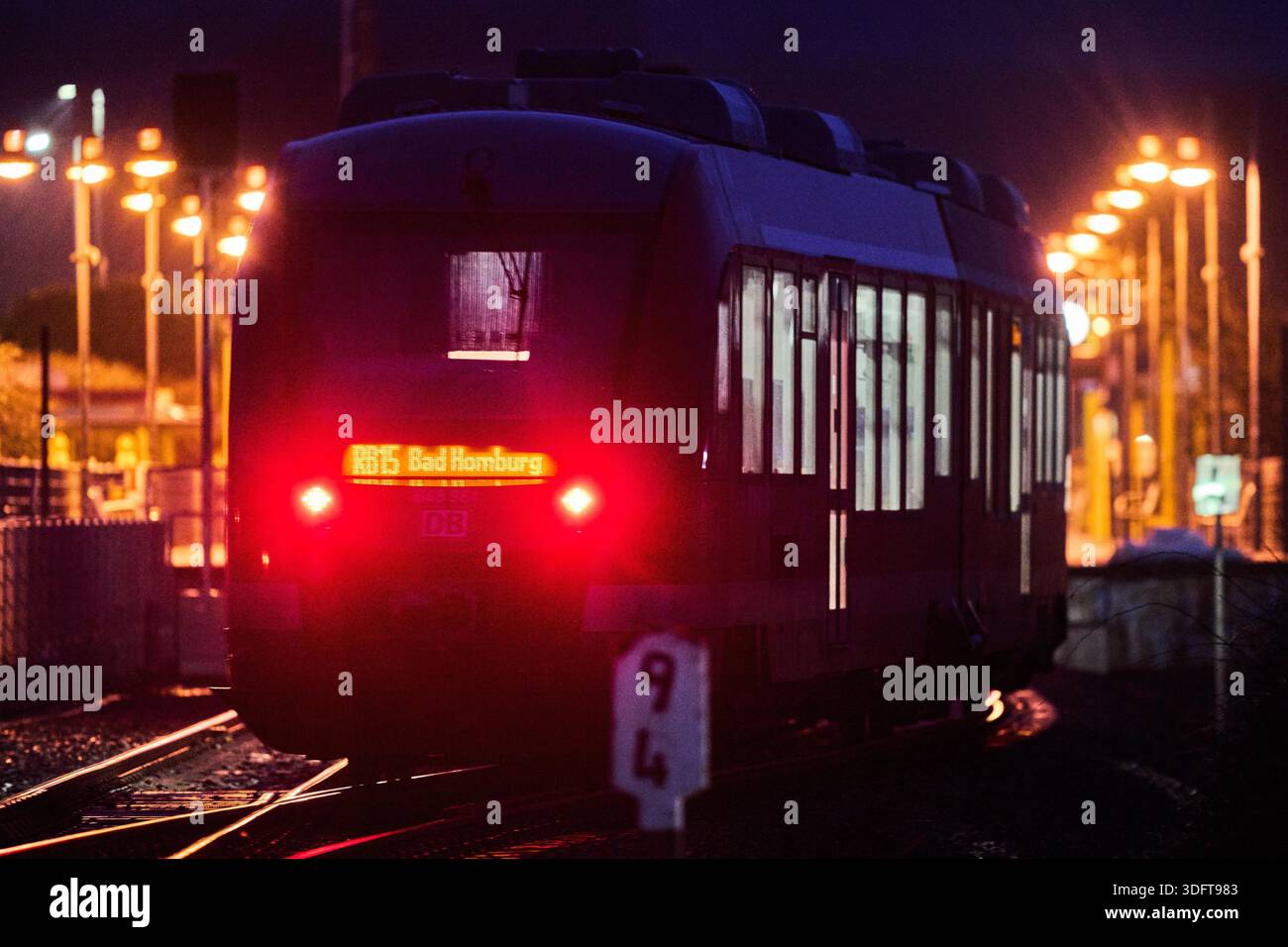 A regional train approaches the railway station in Wehrheim near ...