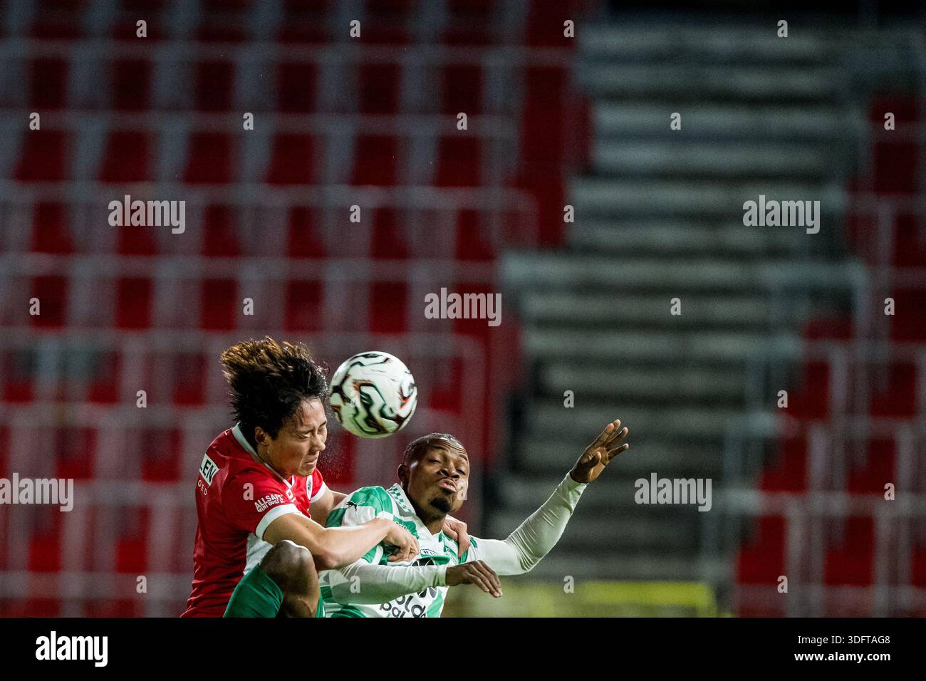 Antwerp's Yuto Tsunashima and RAAL's Jerry Afriyie fight for the ball ...
