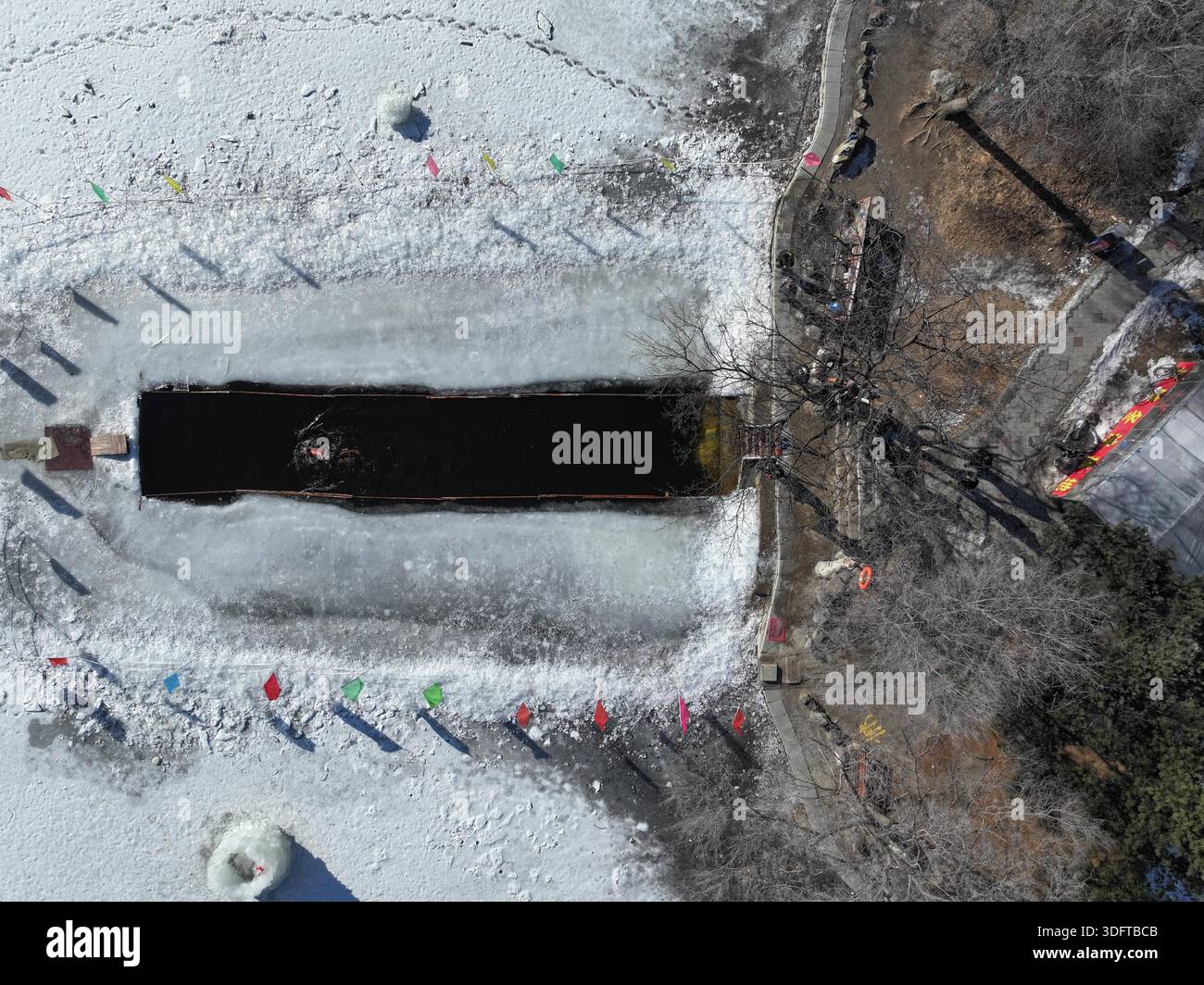 Aerial photo shows visitors enjoying winter sports at Beiling Park in ...