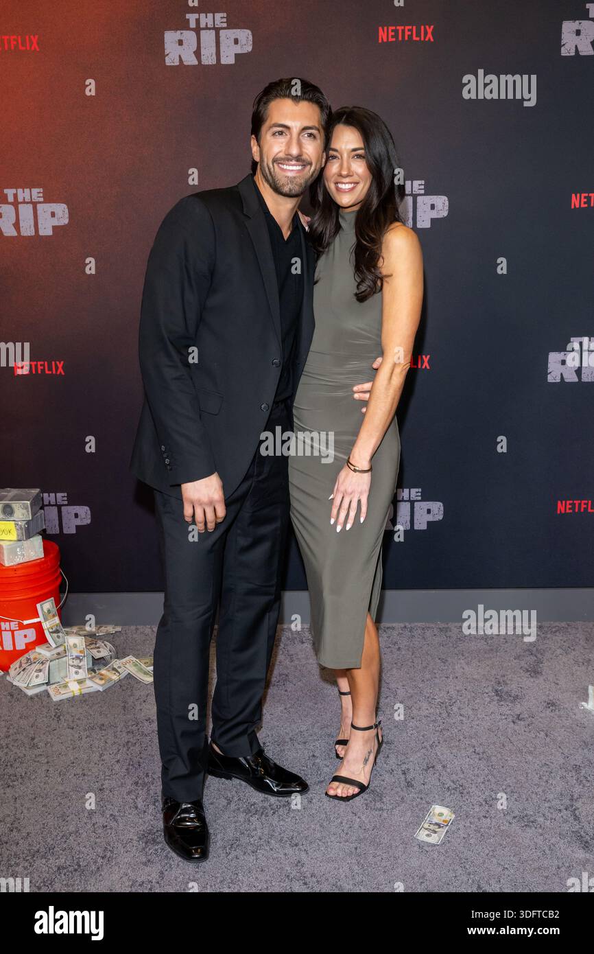(L-R) Jason Tartick and Kathryn Hurley attend Netflix's "The Rip" New ...