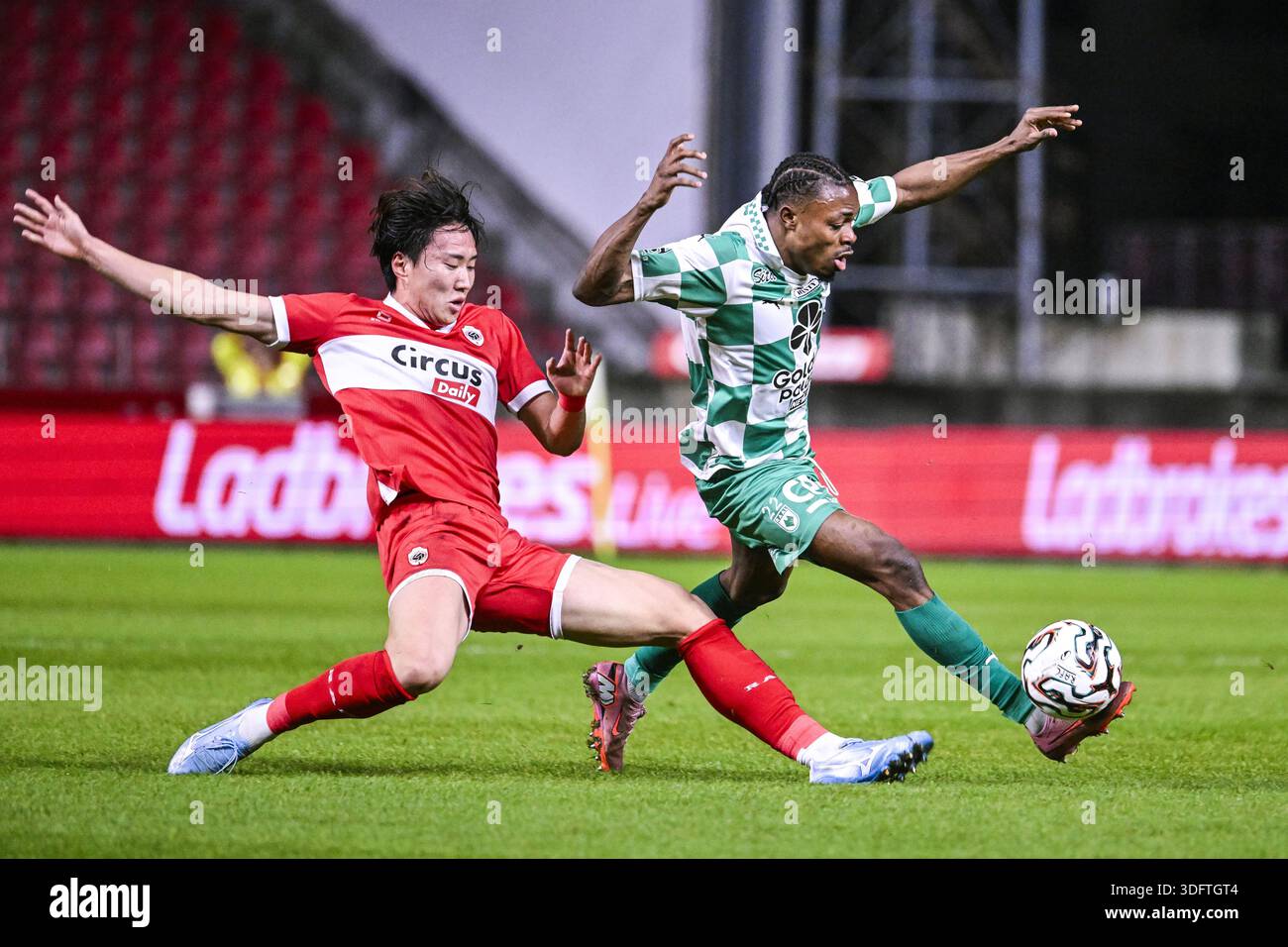 Antwerp's Yuto Tsunashima and RAAL's Jerry Afriyie pictured in action ...