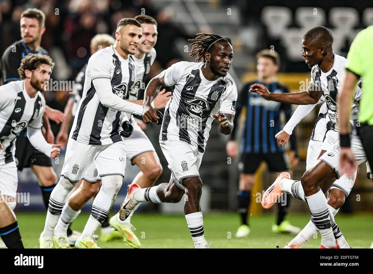 Charleroi's Parfait Guiagon celebrates after scoring during a soccer ...