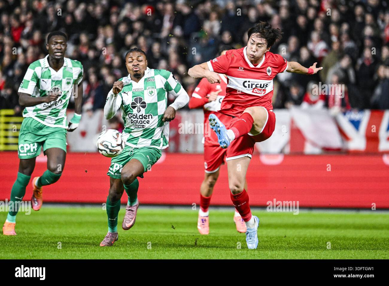 RAAL's Jerry Afriyie and Antwerp's Yuto Tsunashima pictured in action ...