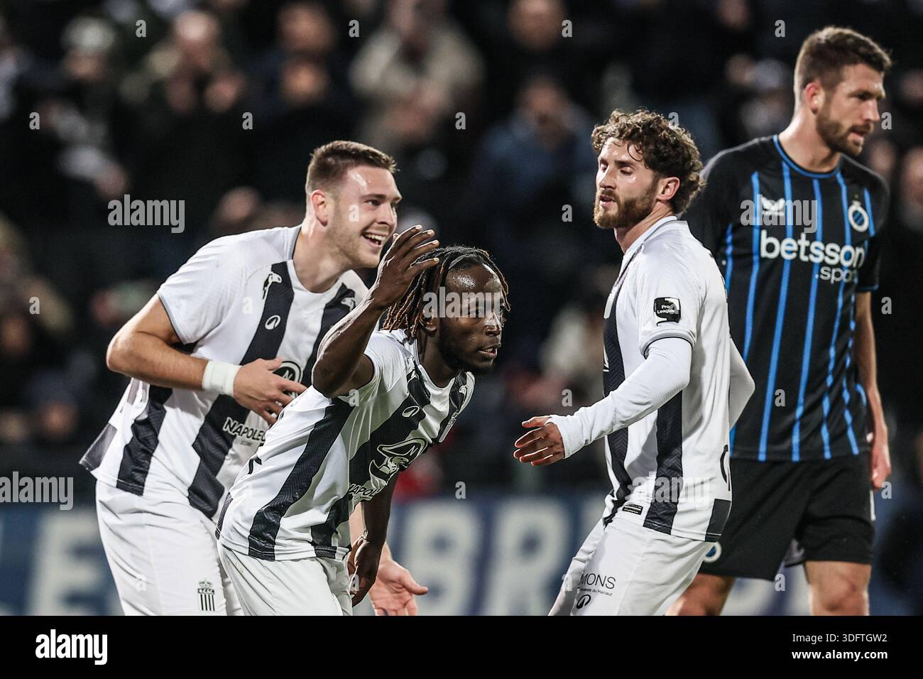 Charleroi's Parfait Guiagon celebrates after scoring during a soccer ...