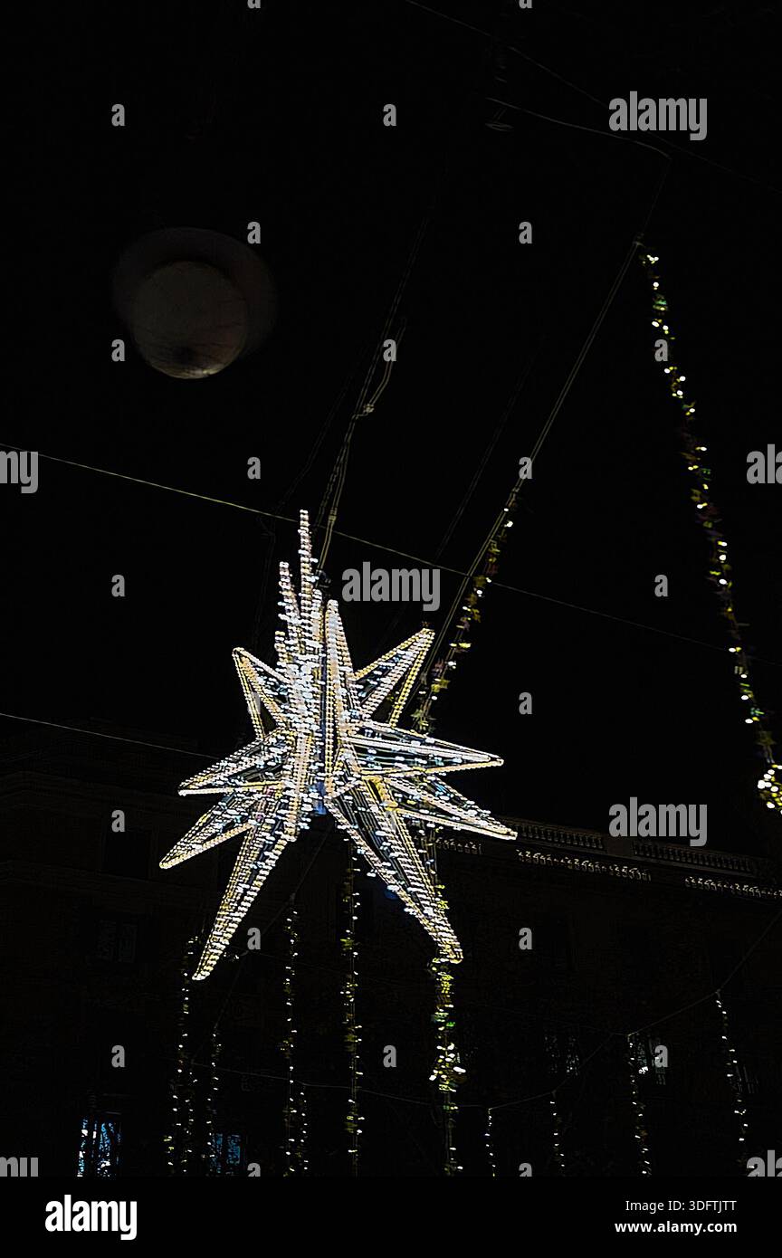 Illuminated Christmas star motif floating in the night, ideal as a ...