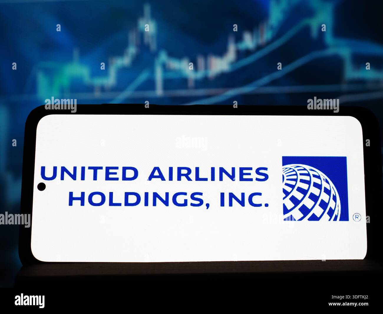In this photo illustration, United Airlines Holdings logo seen ...