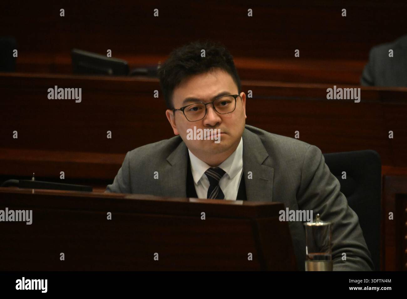 A genial view showing Jonathan Leung Chun sitting at the chambers at ...