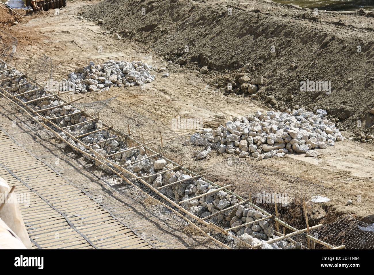 Construction site foundation work featuring steel reinforcement bars ...