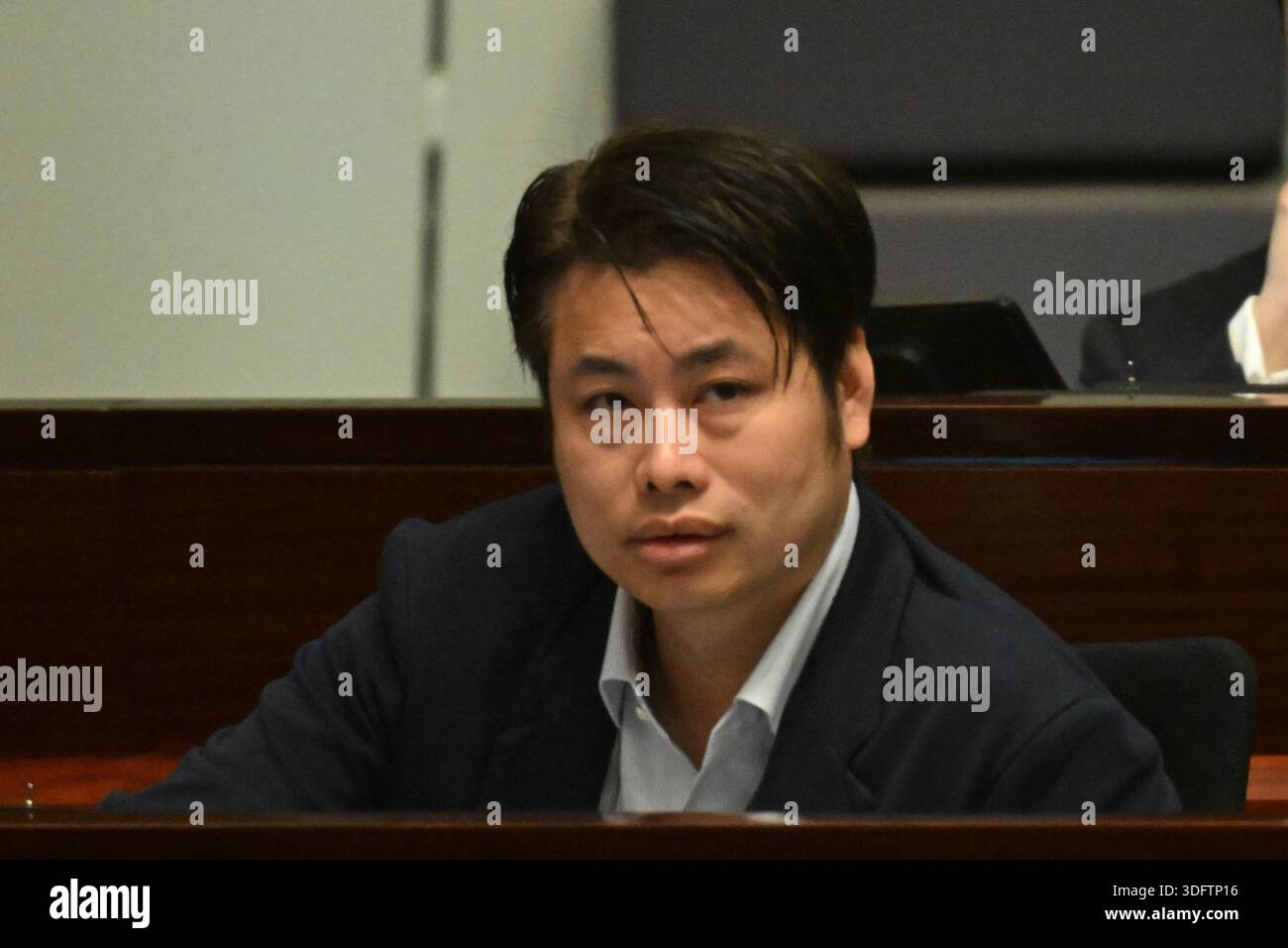 A genial view showing Steven Ho Chun-yin sitting at the chambers at the ...