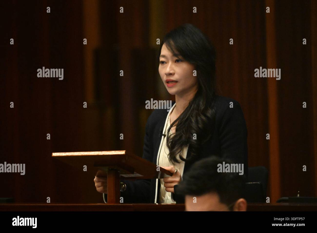 A genial view showing Elaine Chik Kit-ling sitting at the chambers at ...