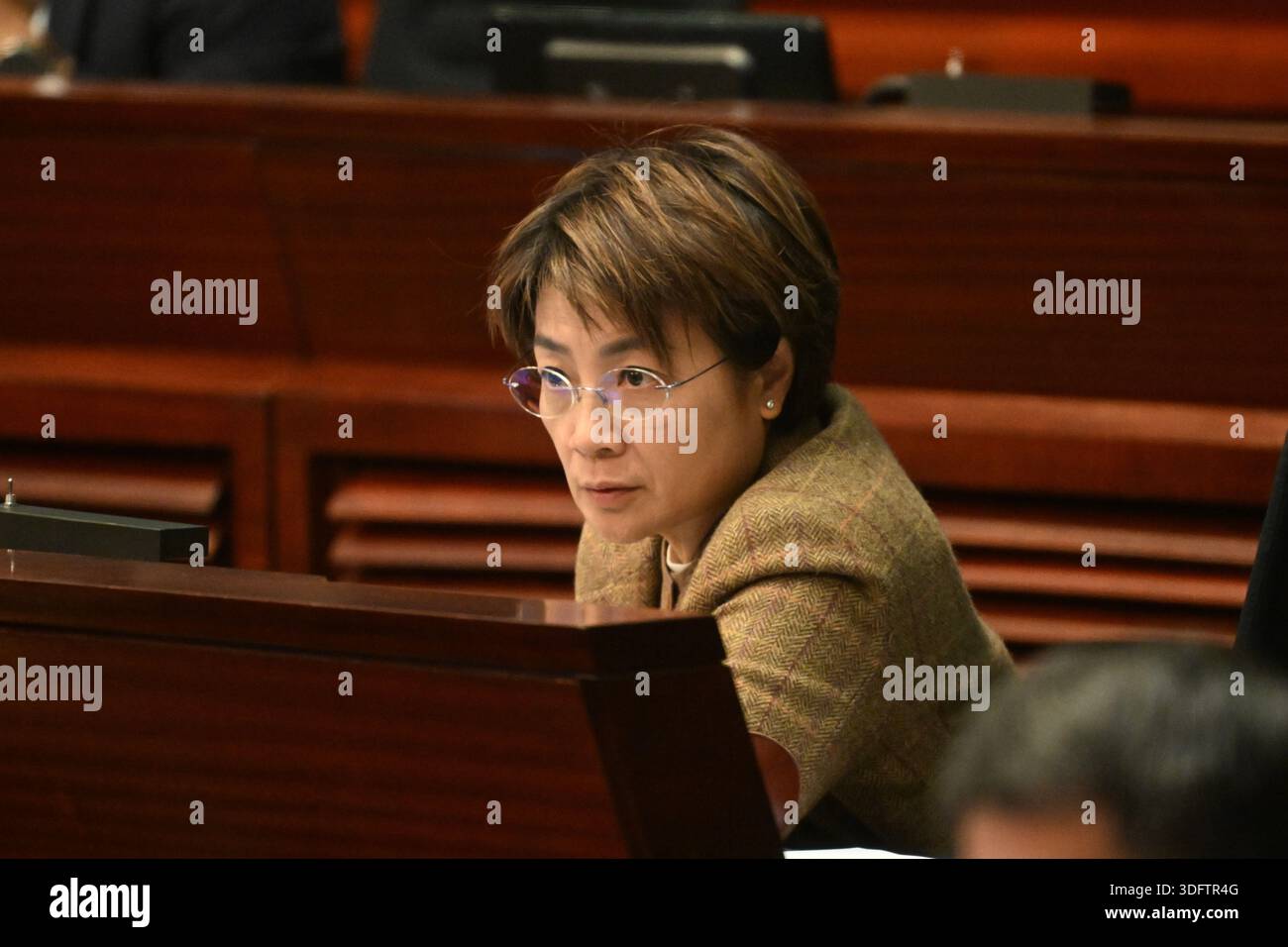 A genial view showing Christine Fong Kwok-shan sitting at the chambers ...