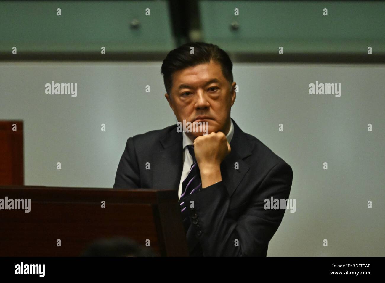 A genial view showing Andrew Yao Cho-fai sitting at the chambers at the ...