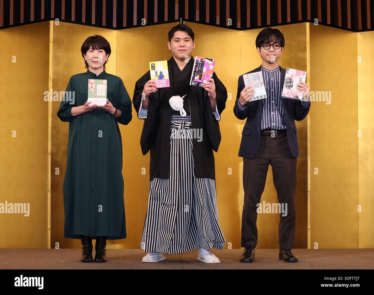 (L-R) Teru Shimazu who won the Naoki Prize, Ushio Hatakeyama and Makoto ...