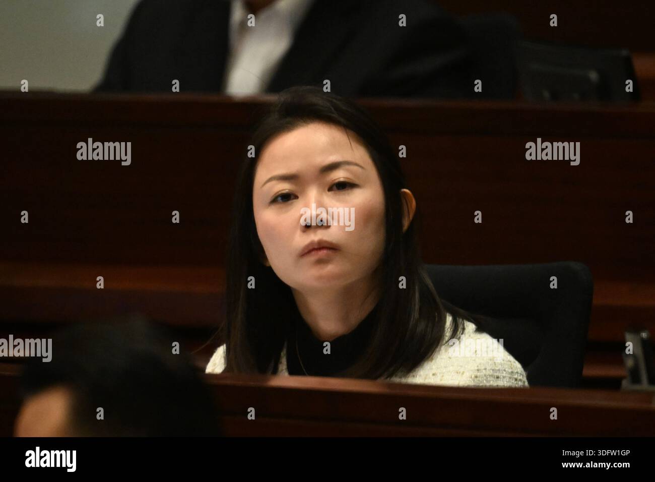 A genial view showing Elaine Chik Kit-ling sitting at the chambers at ...