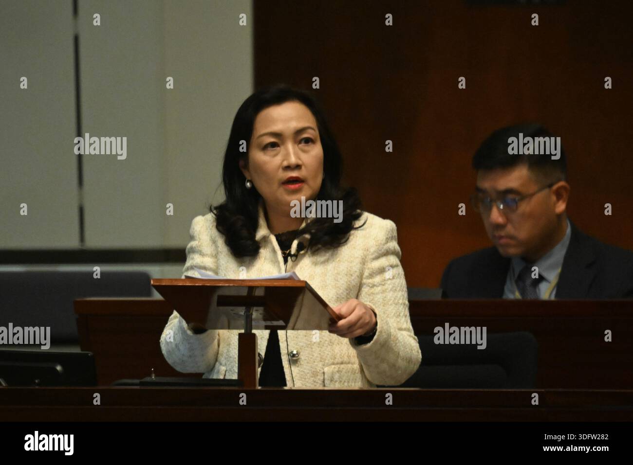 A genial view showing Carmen Kan Wai-mun speaking at the chambers at ...