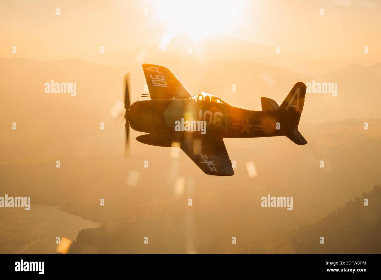 The image shows a Grumman F8F Bearcat warbird in flight, photographed ...