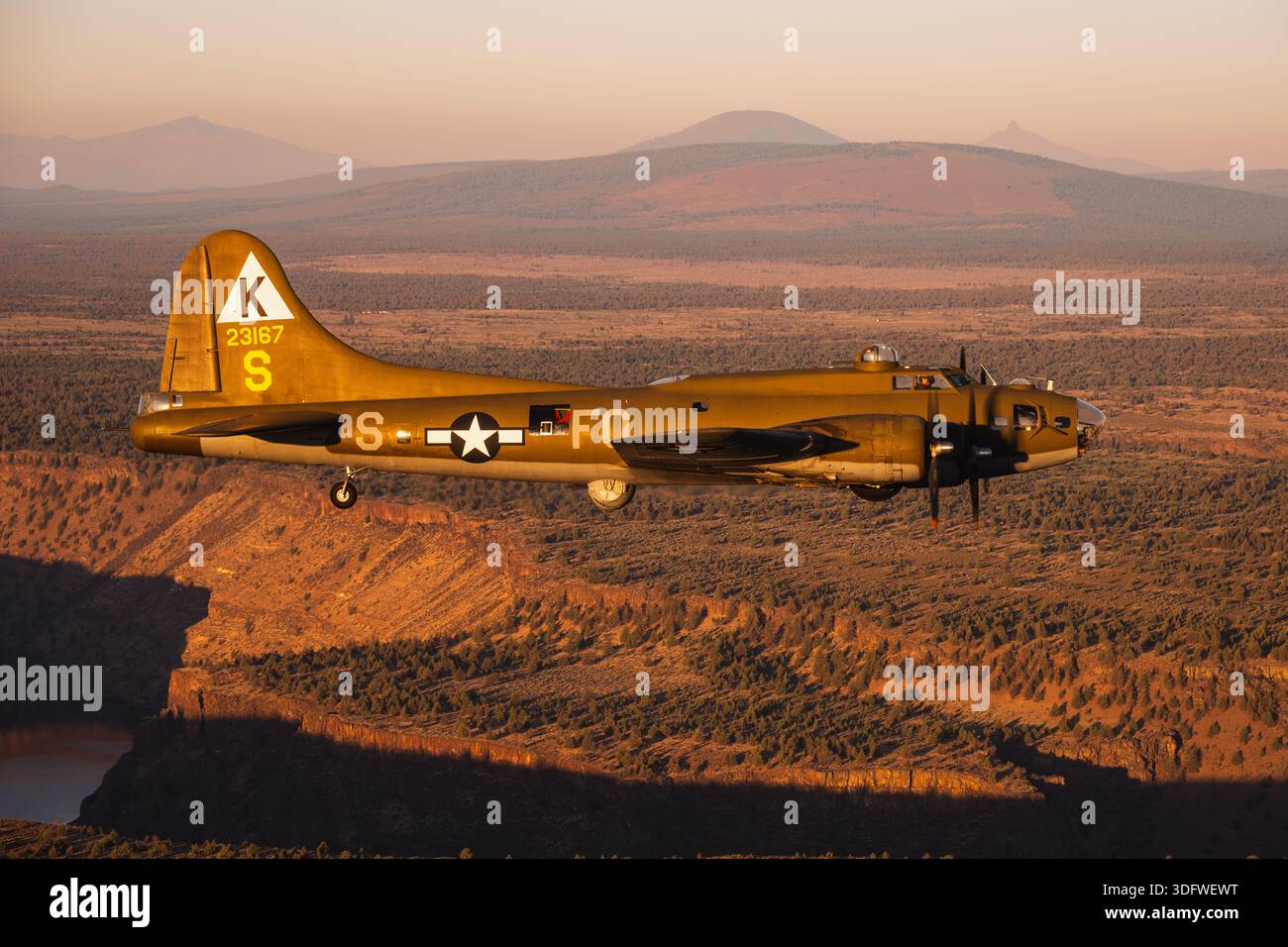 The photograph captures a Boeing B-17G Flying Fortress in sustained ...