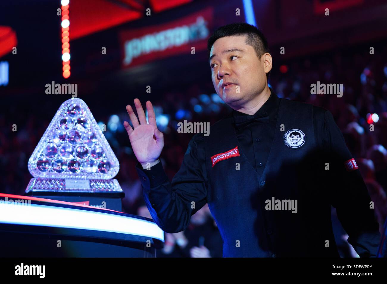 Ding Junhui's walk on during first round match Judd Trump and Ding ...