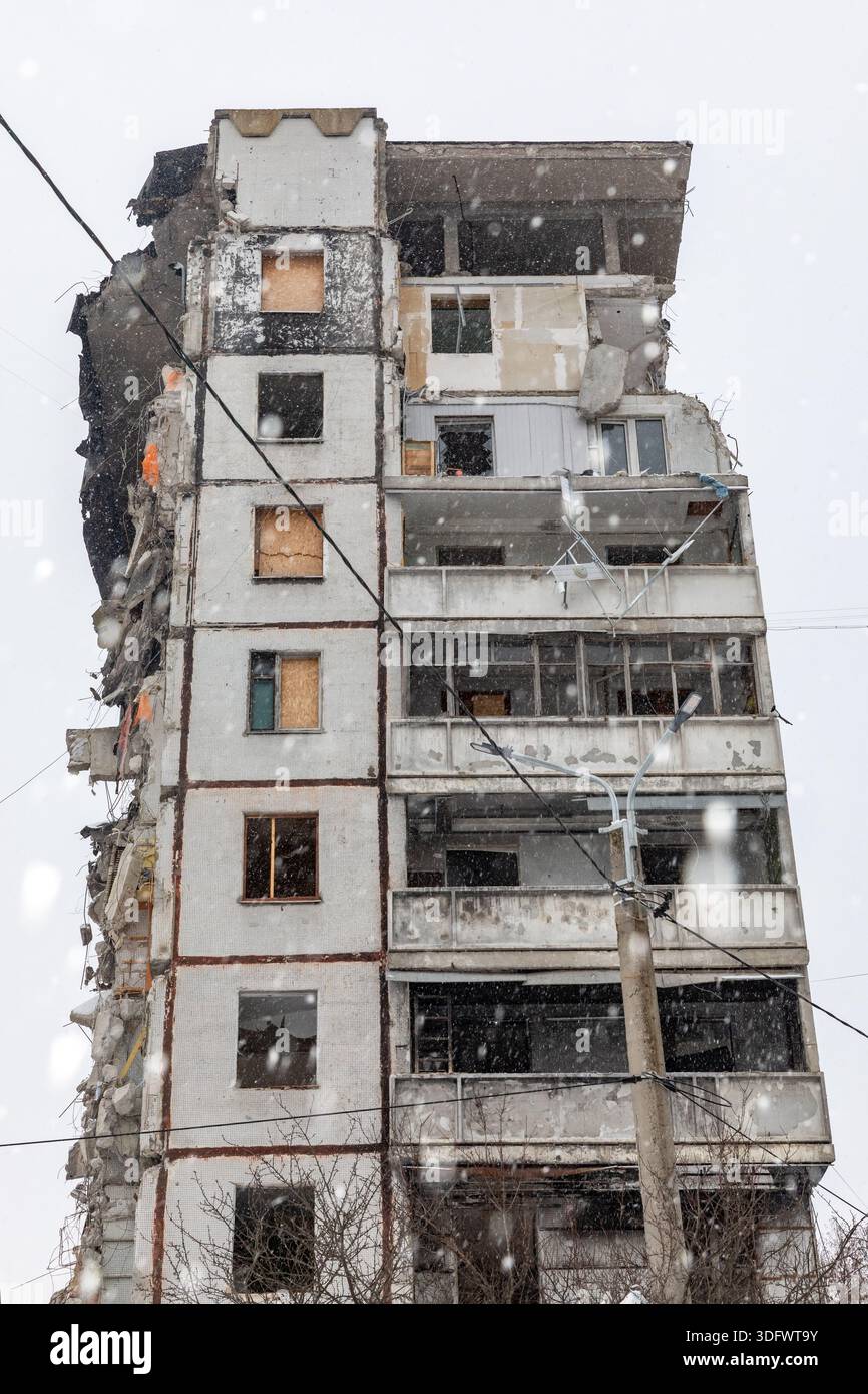 A heavily damaged residential high-rise building in Kharkiv is seen ...