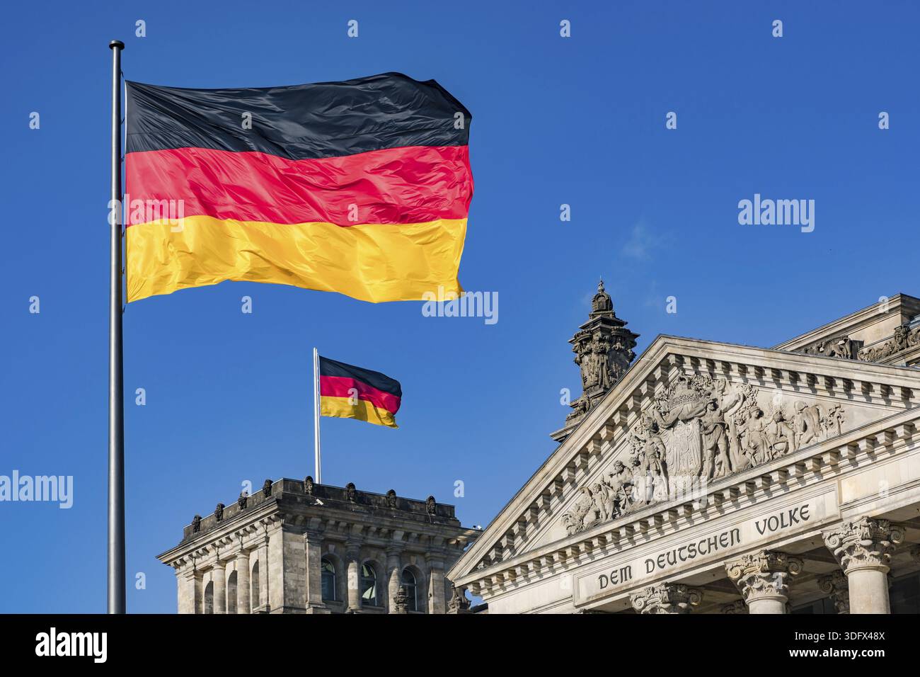 The federal flag in front of the remarkable Reichstag in Berlin as a ...
