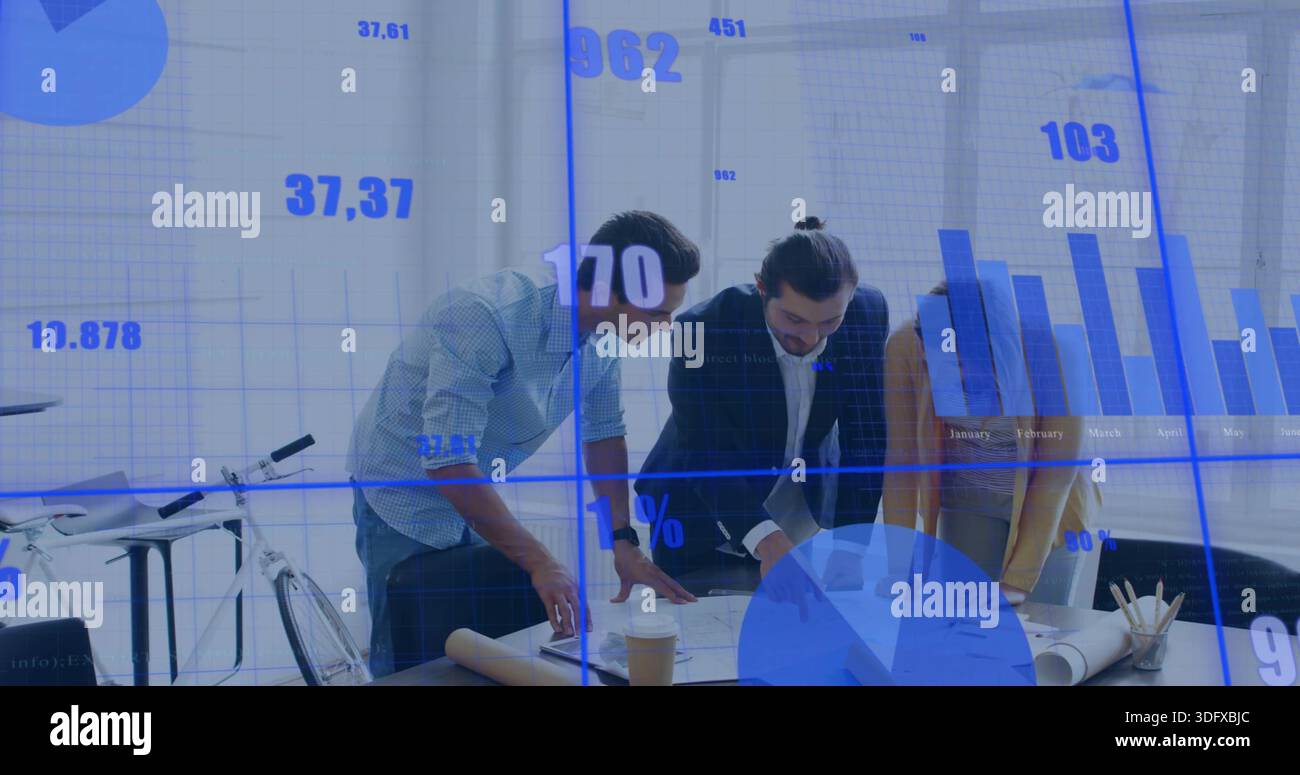 Reviewing three colleagues at meeting table by windows, in mustard ...