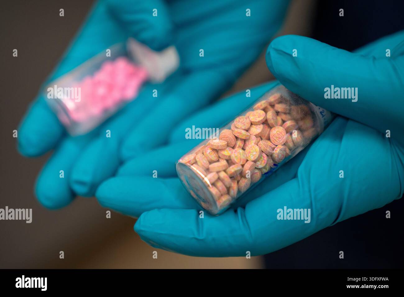 FILE - Jonathan Dumke, a senior forensic chemist with the Drug ...