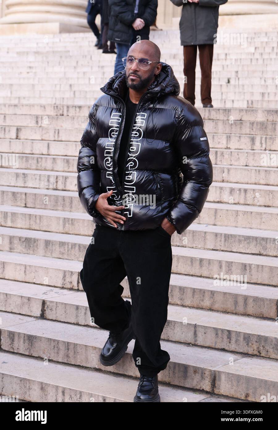 Stomy Bugsy leaving the funeral ceremony for Rolland Courbis at ...