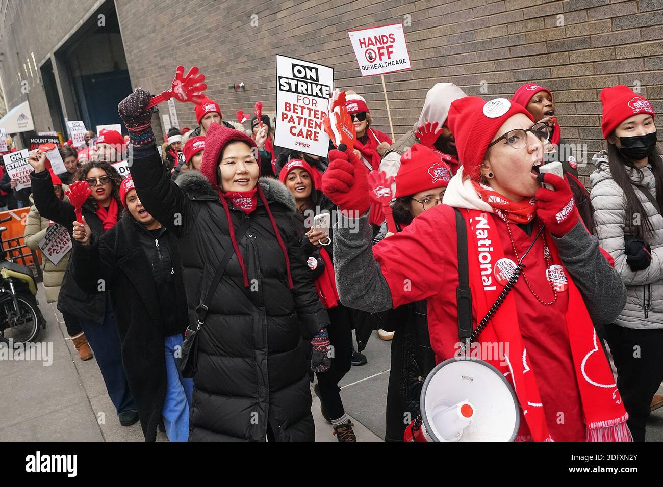 Striking nurses demonstrate outside Mt. Sinai Hospital, in New York ...