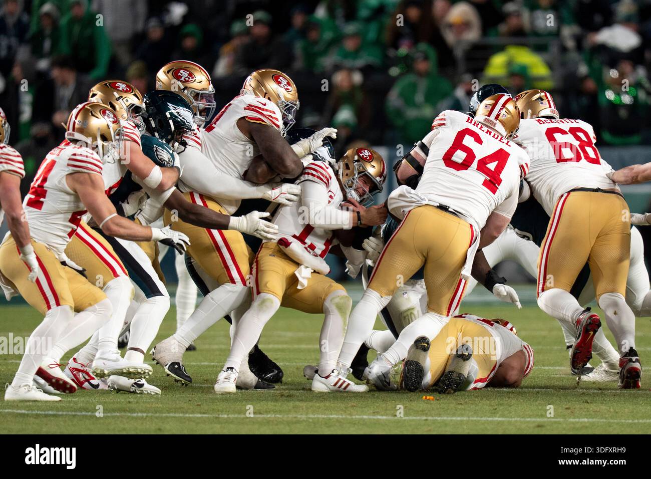 San Francisco 49ers quarterback Brock Purdy, center, runs a quarterback ...