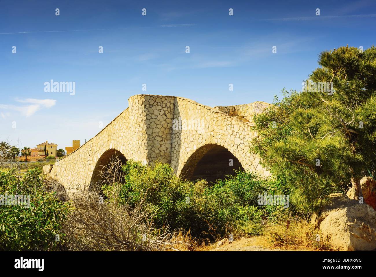 An ancient stone bridge at Spain, blue sky Stock Photo - Alamy