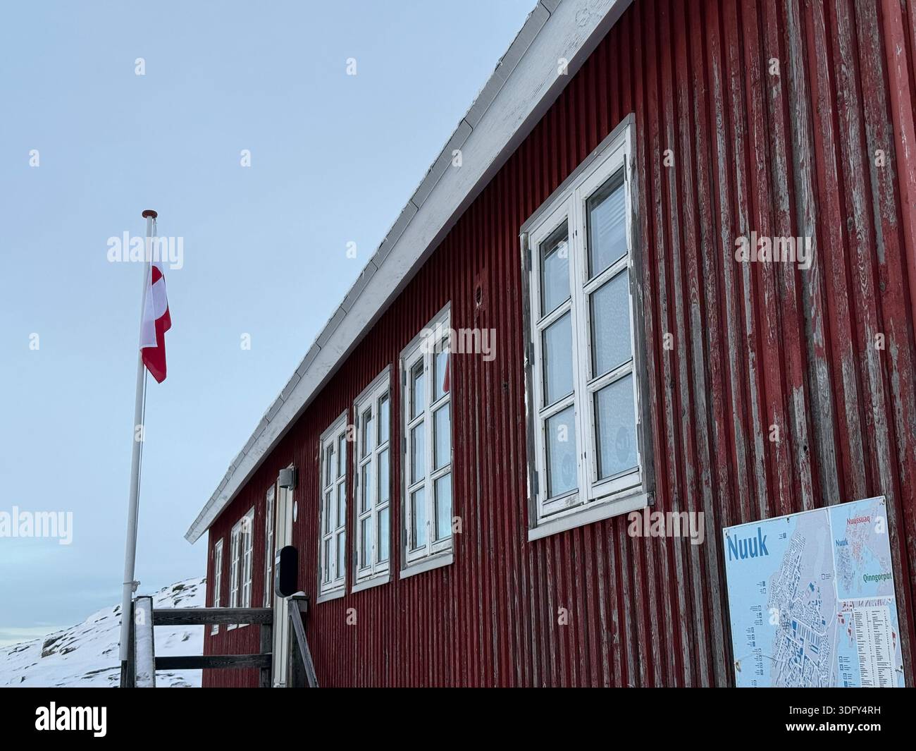 14 January 2026, Greenland, Nuuk: The flag of Greenland flies in the ...